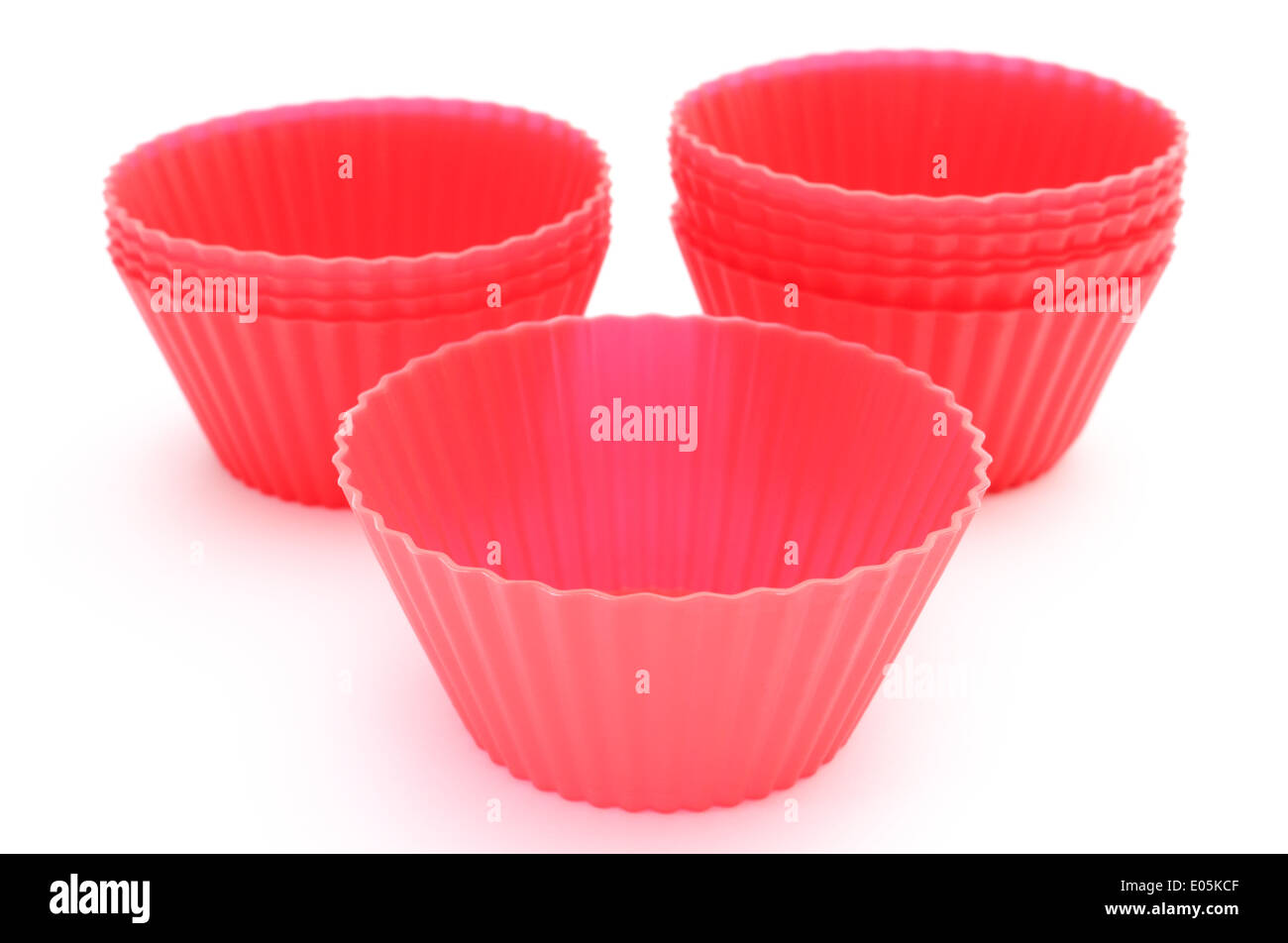 Red silicone cups for cupcakes isolated on white background Stock Photo ...