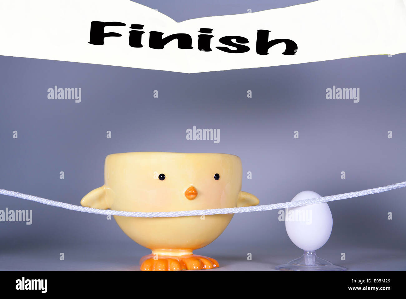 Yellow chicken and white egg crossing the finish line - but which came ...