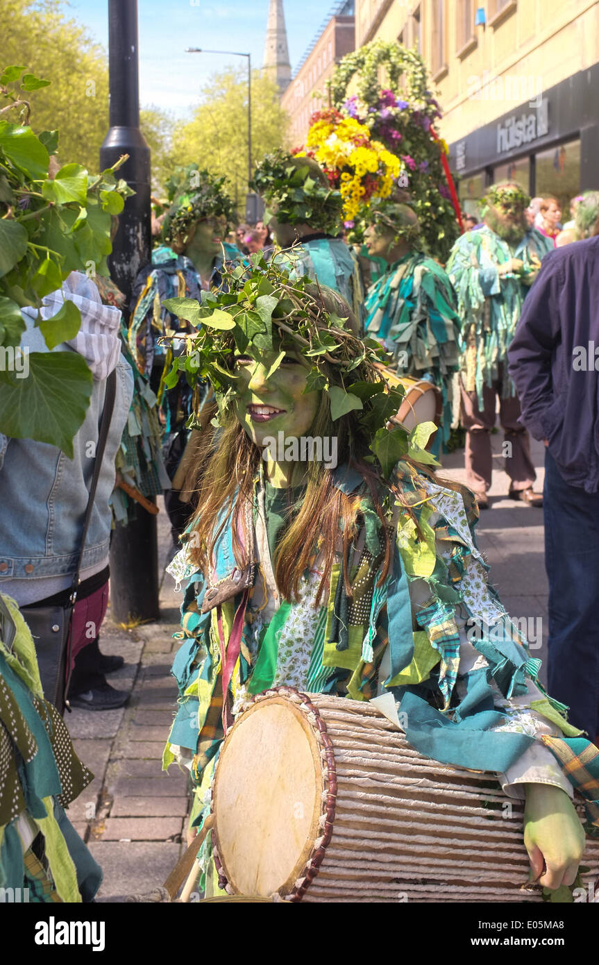 Bristol, UK. 3rd May 2014. Green Man Morris Girl drums a beat for the ...