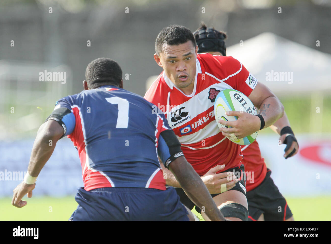 Hendrik Tiu of Japan (R) in action against Timothy Bheweni of the ...