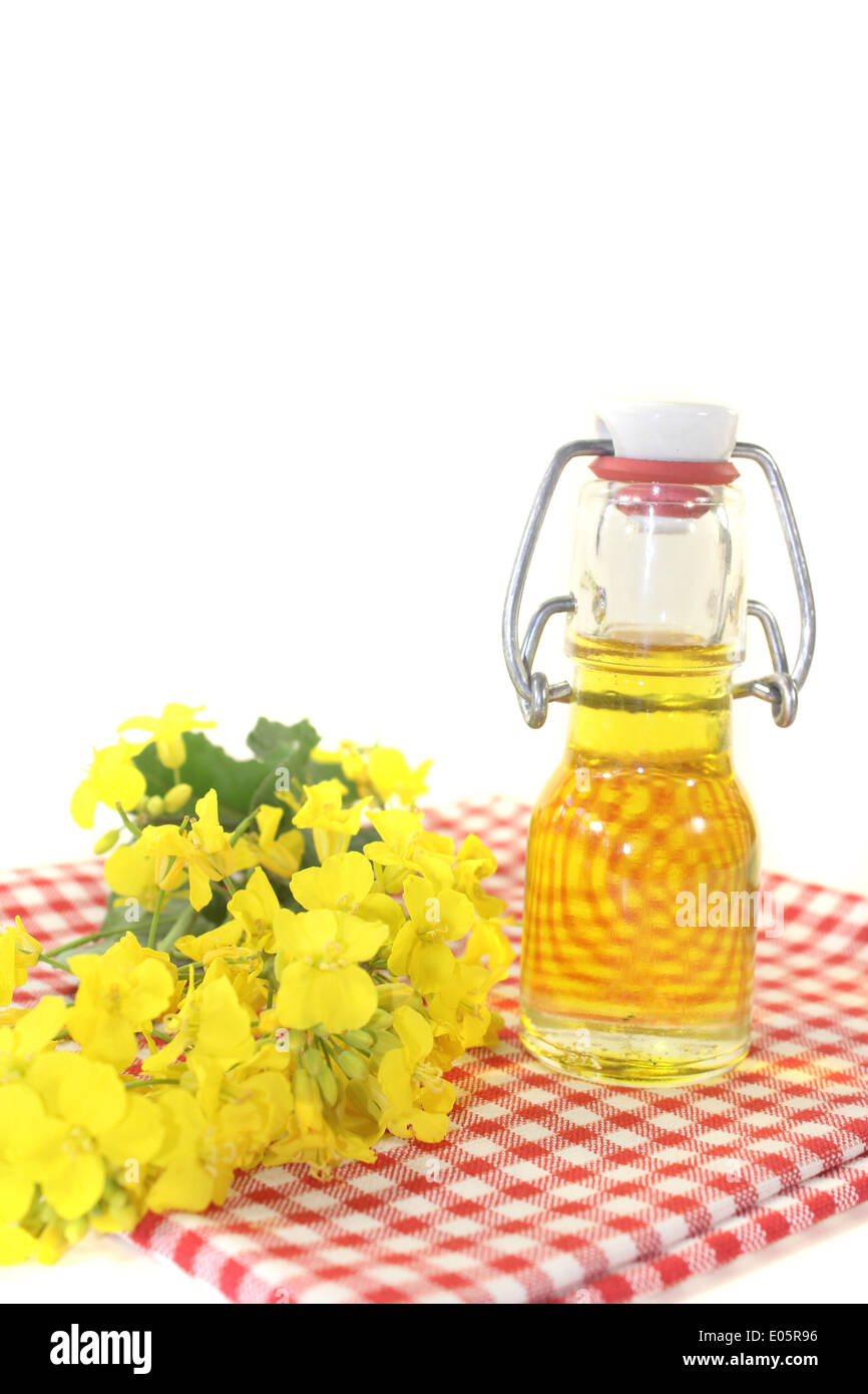 fresh Rapeseed oil on a light background Stock Photo - Alamy
