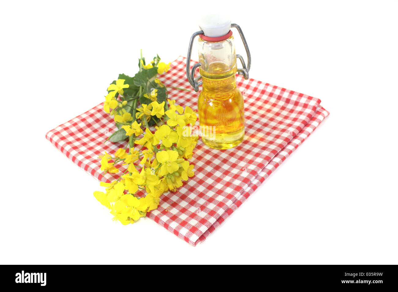 fresh yellow Rapeseed oil on a light background Stock Photo - Alamy