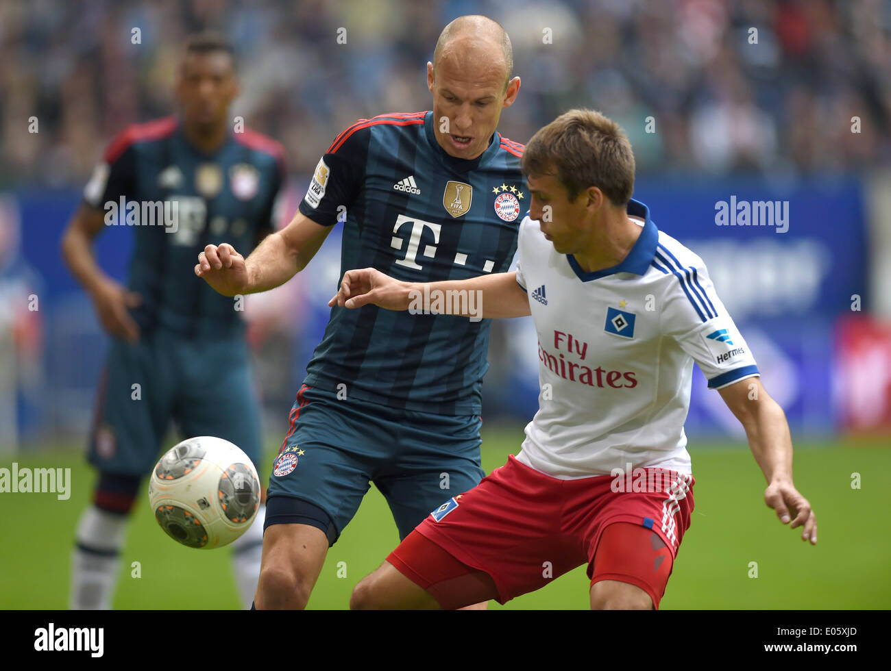 Hamburg, Germany. 03rd May, 2014. Munich's Arjen Robben (L) vies for ...