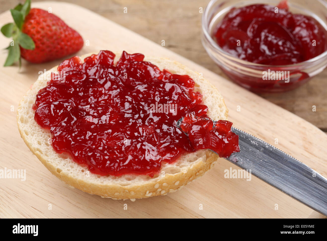 Healthy breakfast with strawberry marmalade on a roll Stock Photo - Alamy