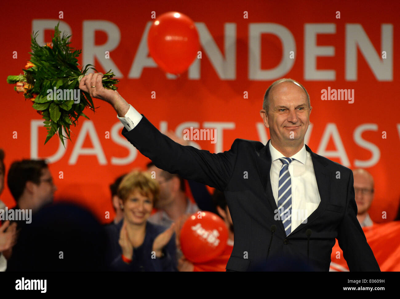 Premier of Brandenburg Dietmar Woidtke (SPD) celebrates with a bouquet ...