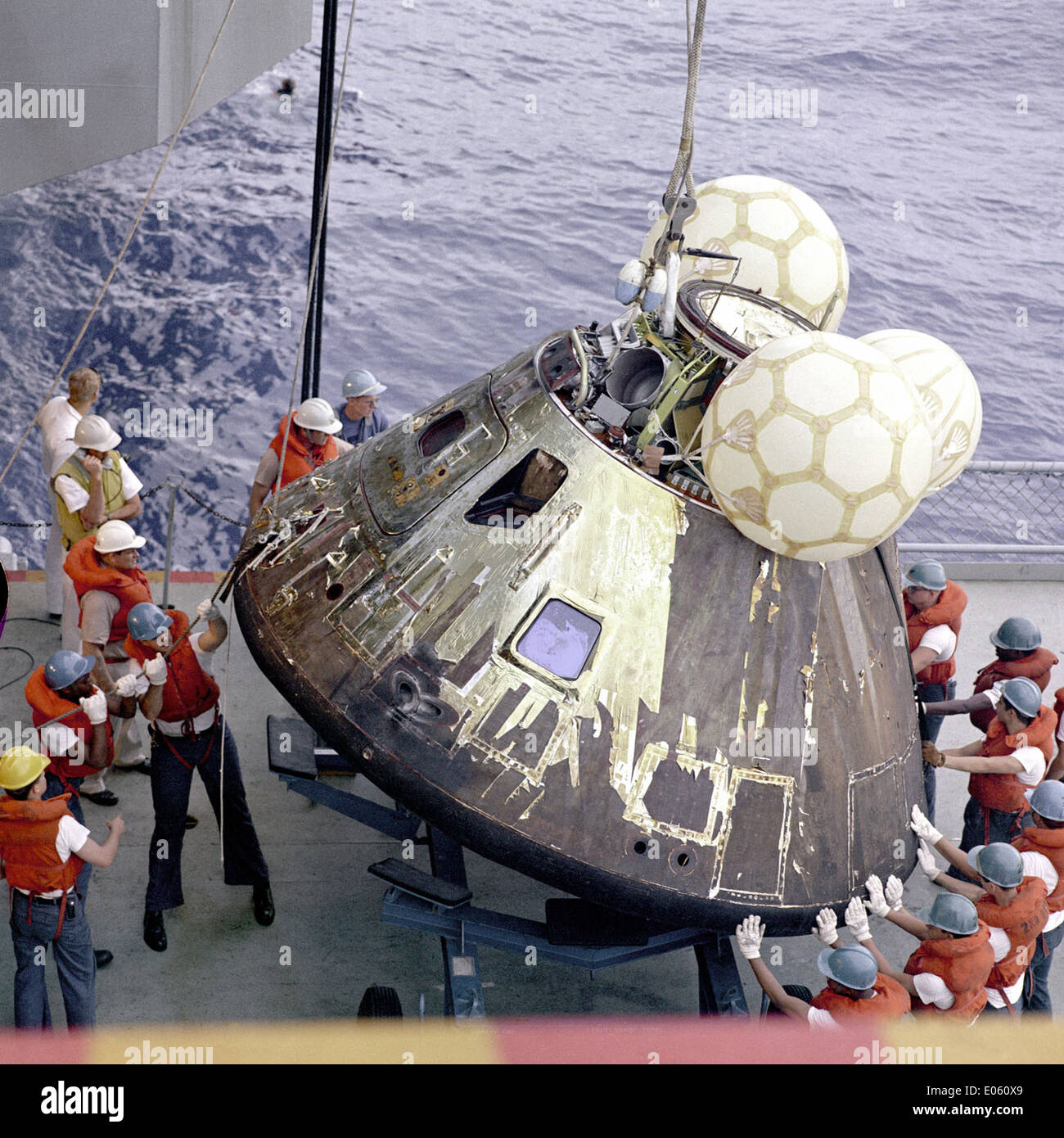 The Apollo 13 Command Module 'Odyssey' is seen on the USS Iwo Jima, a ...