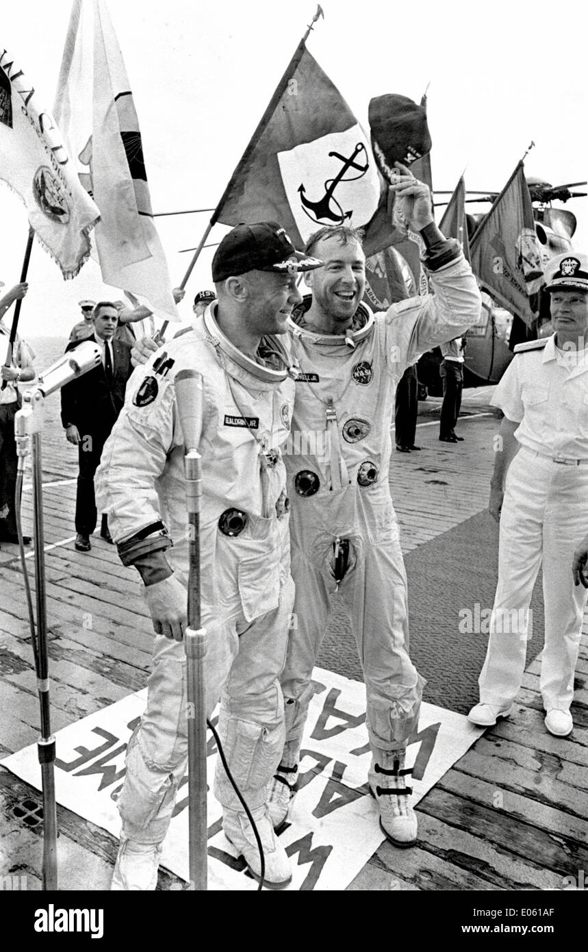 Astronauts Buzz Aldrin and James Lovell are pictured aboard the USS ...
