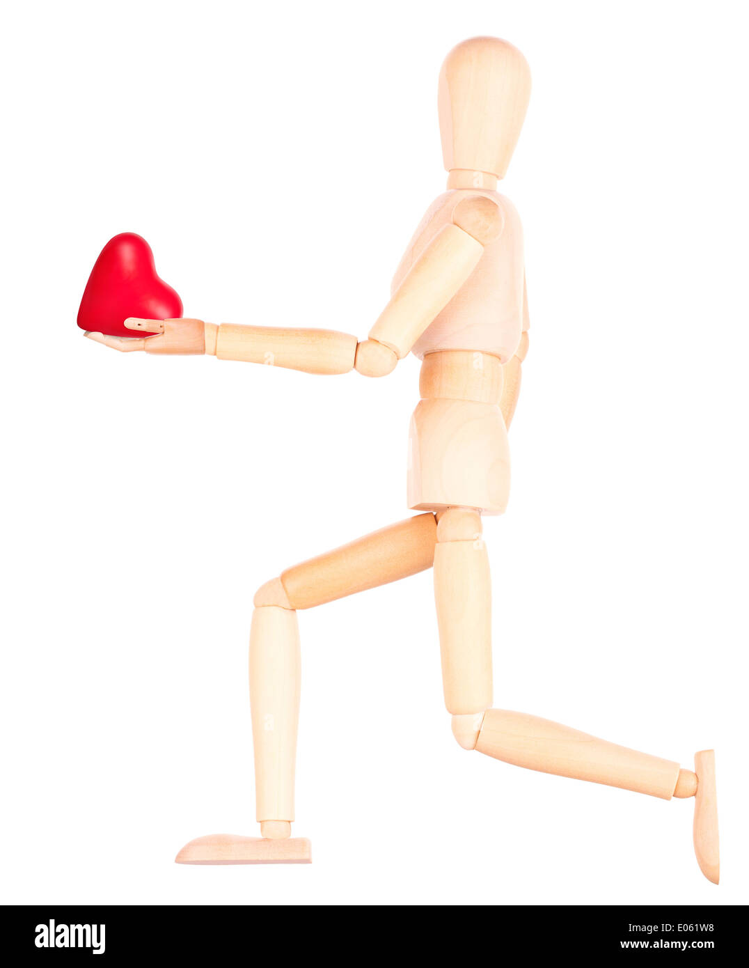 wooden Dummy holding red heart isolated. Health insurance or love ...