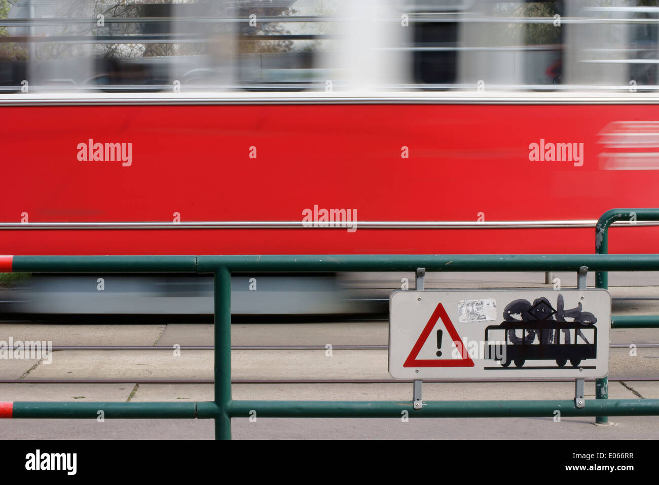 Passing Rushing tram Stock Photo - Alamy