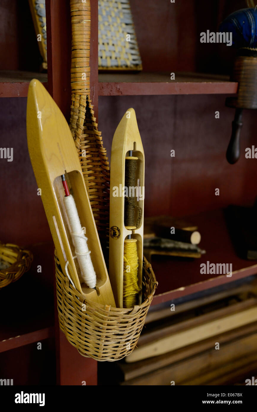 Textile industry flying shuttles in a woven basket on display at ...