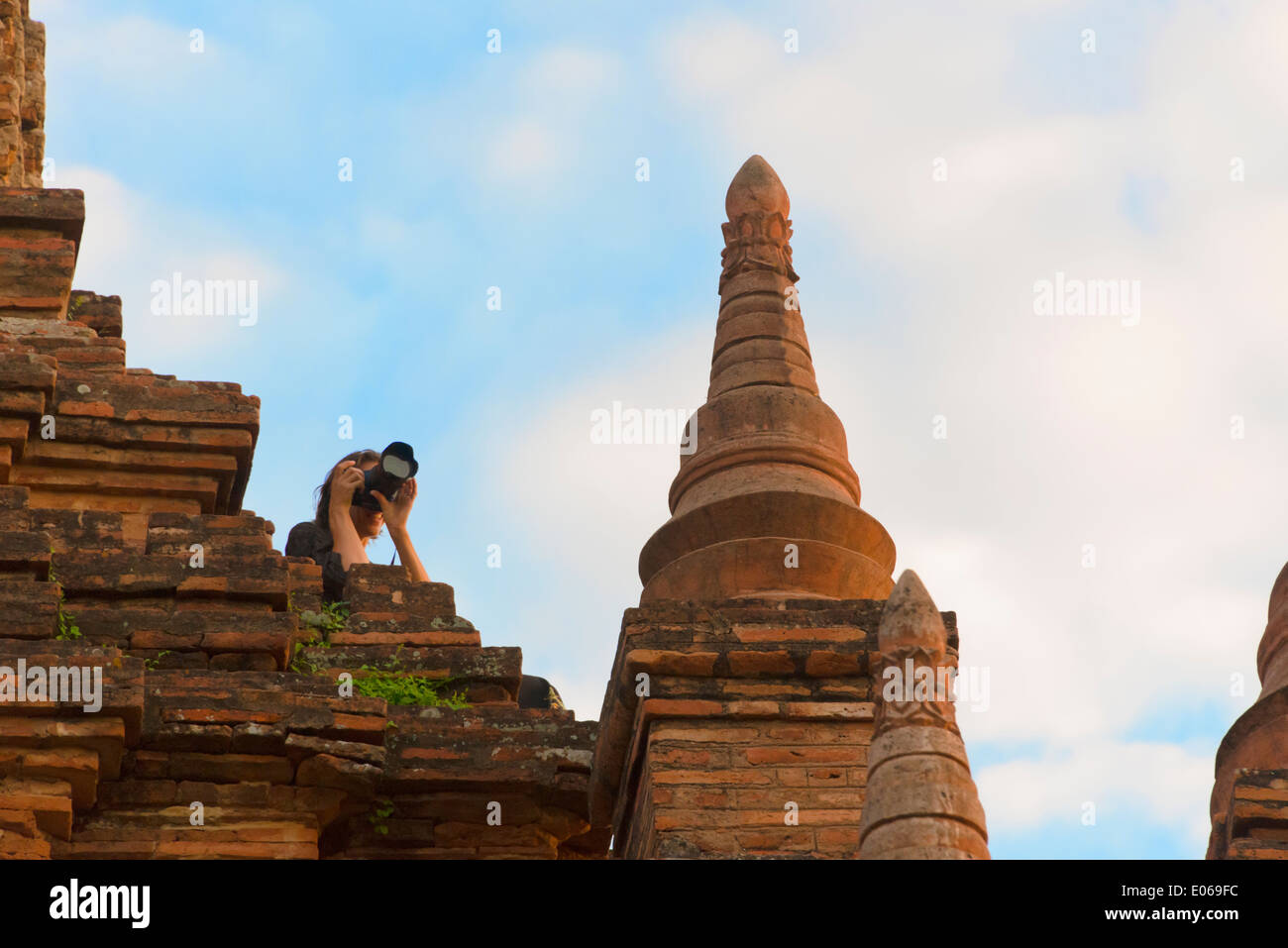 Tourist photographing temples and pagodas at sunset, Bagan, Myanmar ... Tourist photographing temples and pagodas at sunset, Bagan, Myanmar ...
