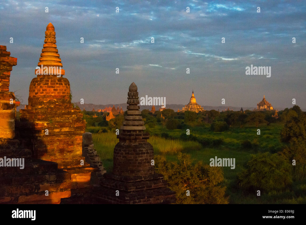 Ancient temples and pagodas in the jungle at sunrise, Bagan, Myanmar ...