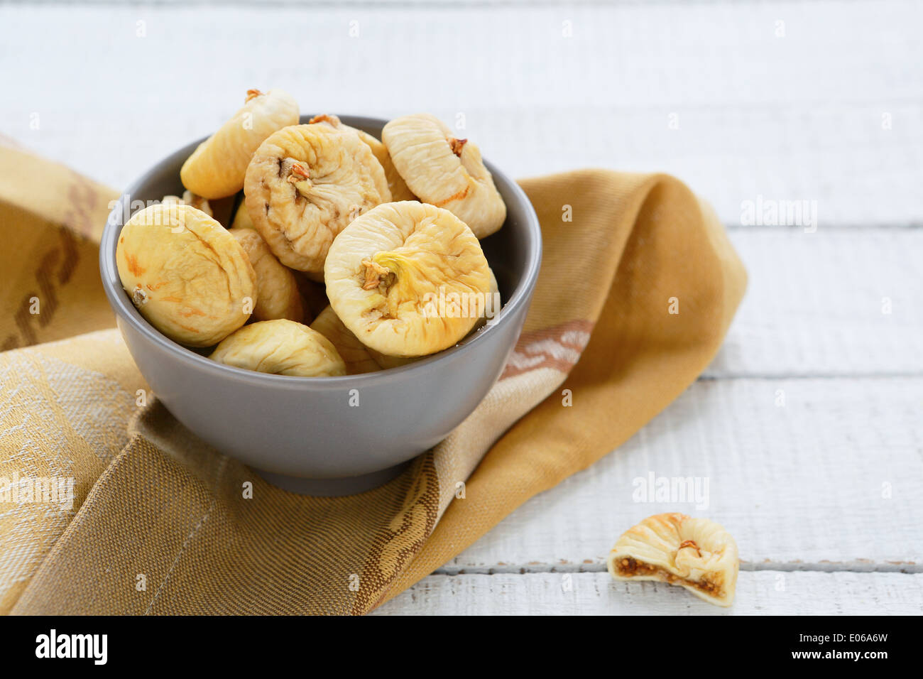 Dried mini figs in a bowl, food closeup Stock Photo - Alamy