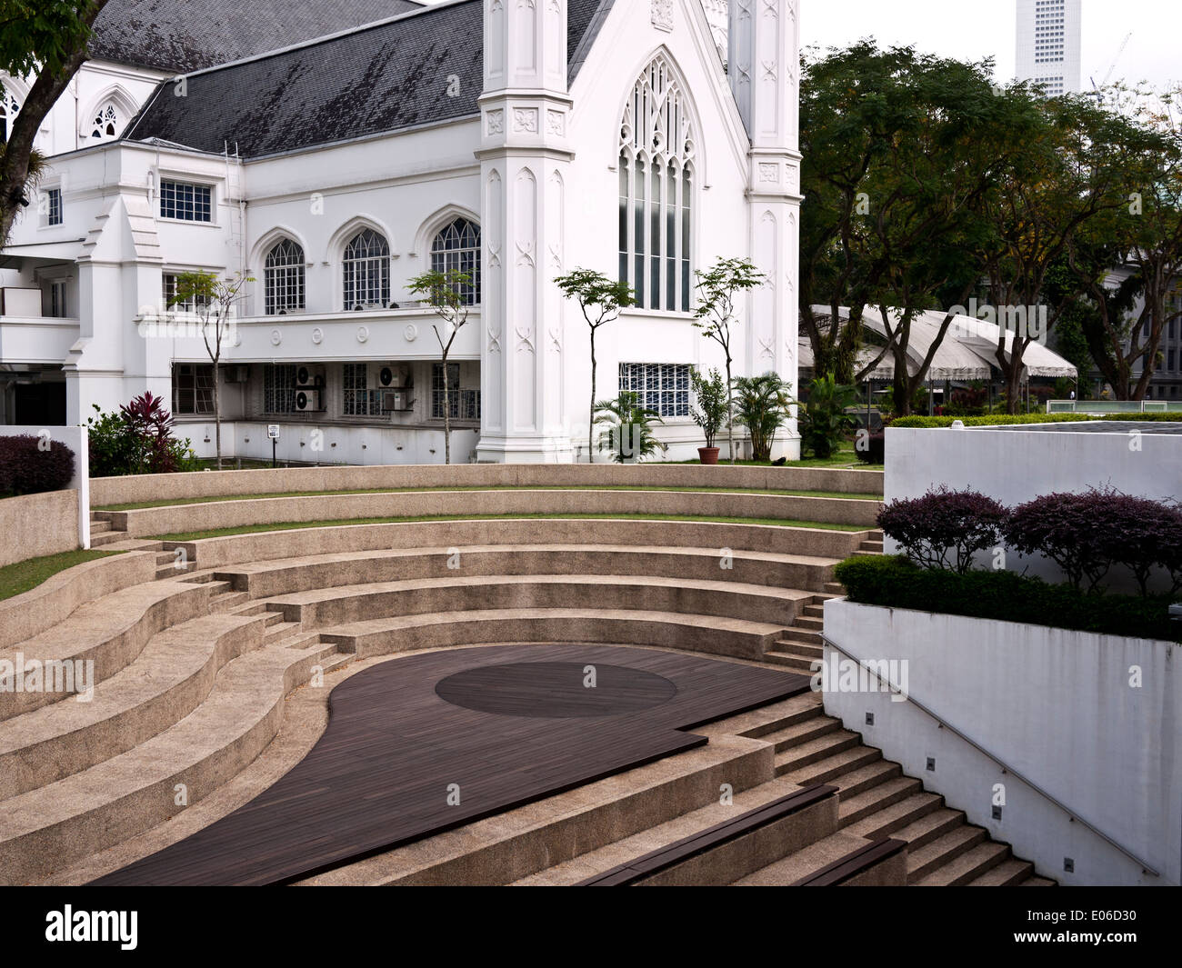 View from the amphitheatre steps of the exterior of the white painted ...