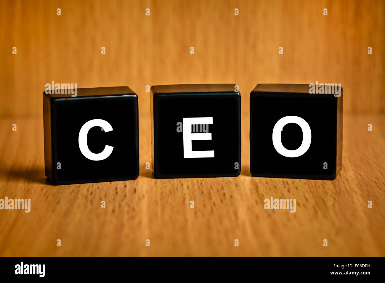 CEO or chief executive officer text on black block Stock Photo - Alamy
