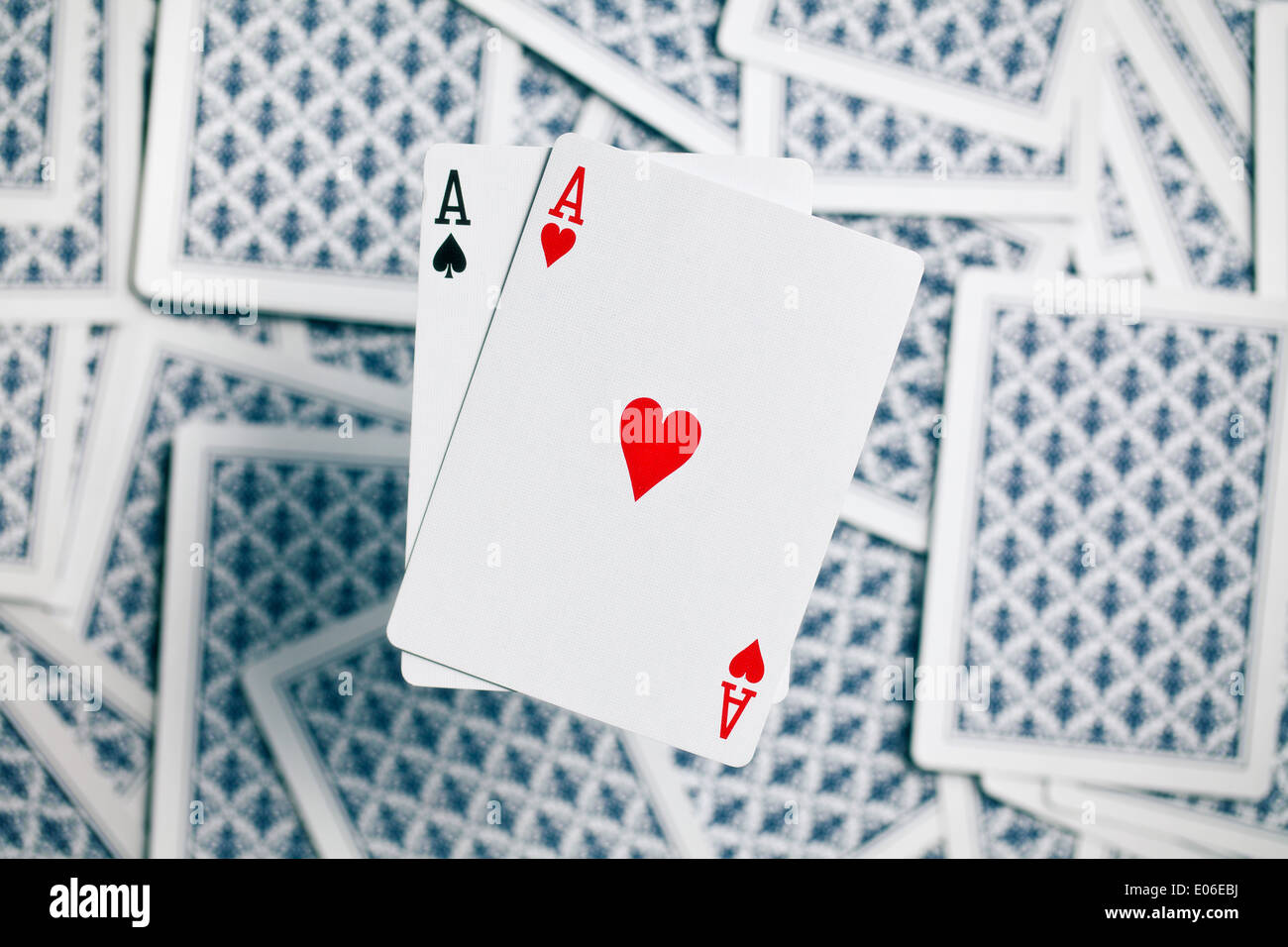 two aces and background made from poker cards Stock Photo - Alamy