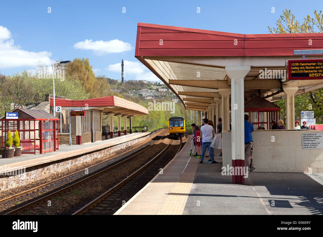 Sowerby Bridge station with Wainhouse Tower in the background, West ...