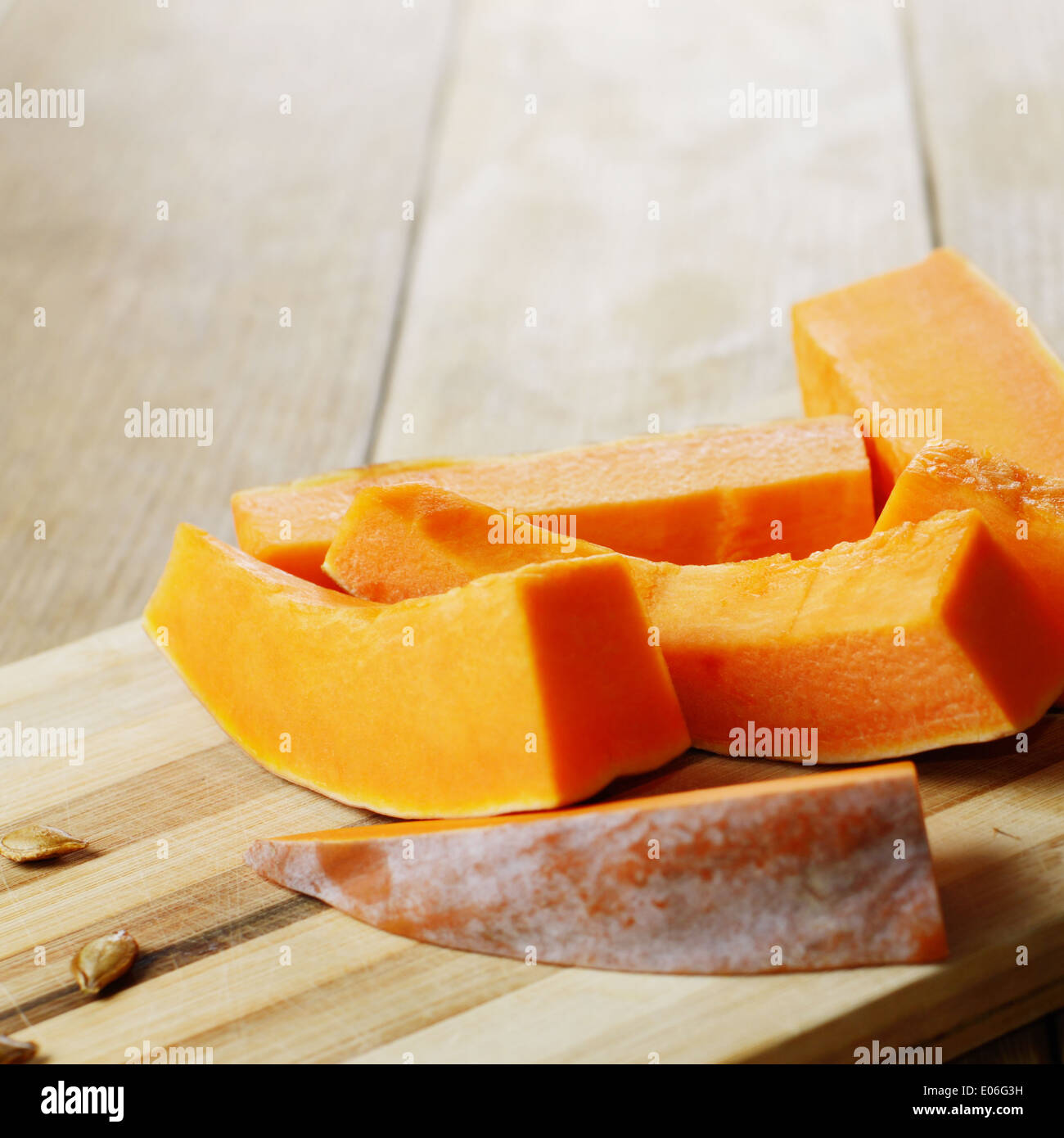 Homemade halloween pumpkin slices on cutting board Stock Photo - Alamy