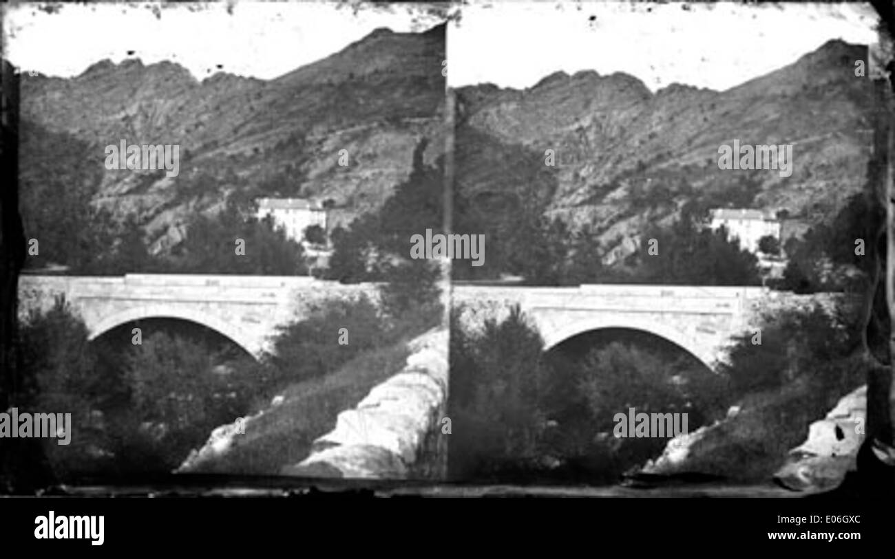 A photograph of the stone bridge in Eaux-Bonnes, a small town in the ...