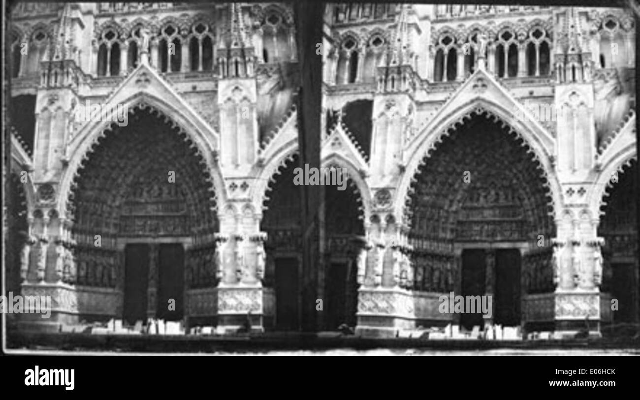 This photograph shows the side door of the façade of the Amiens ...