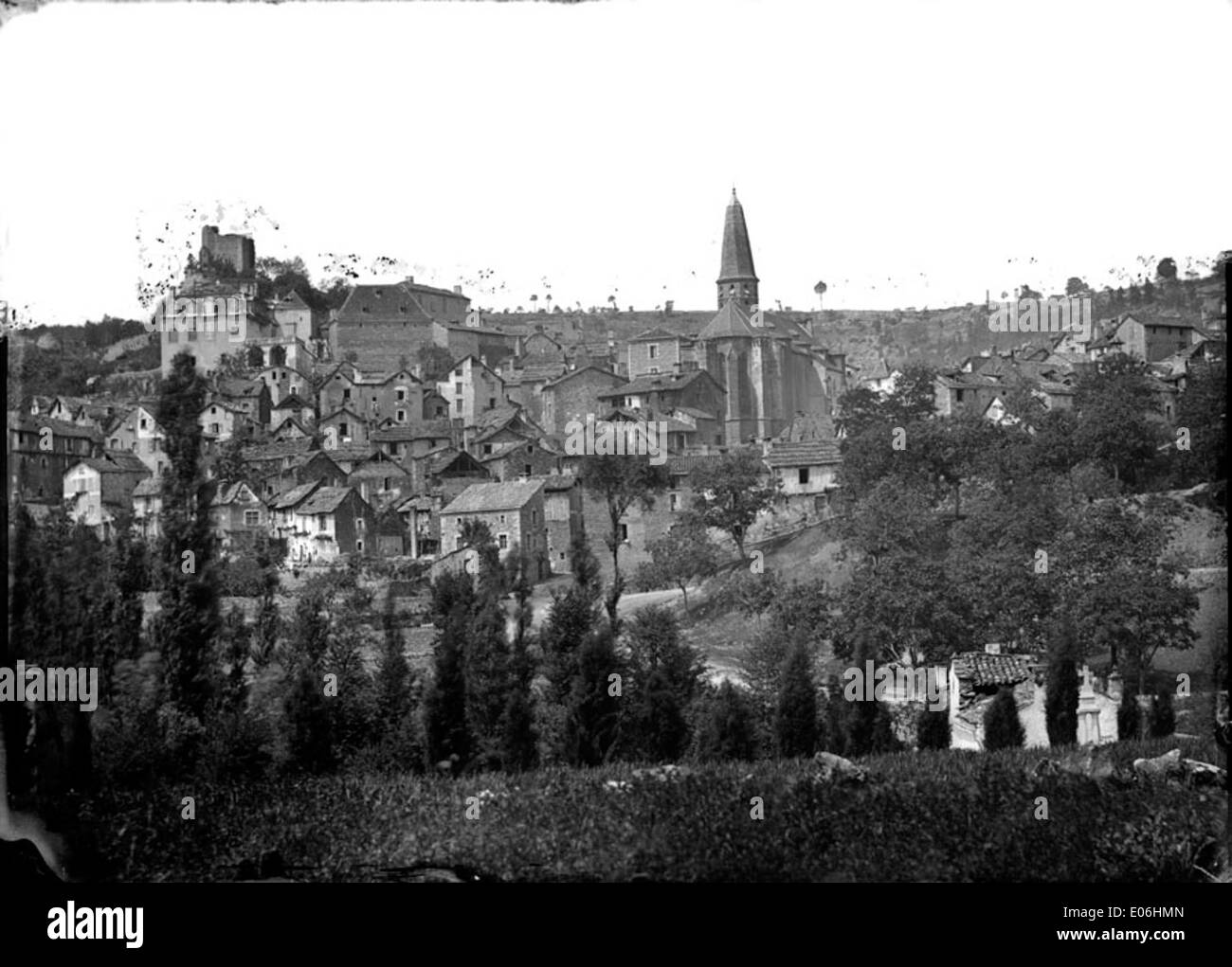 A photograph of a church and its surrounding village, capturing the ...