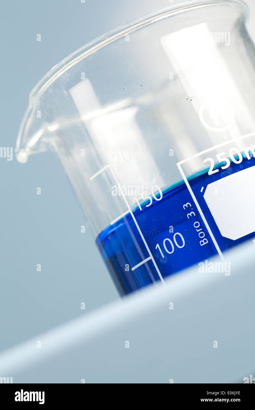 Glass beaker filled with 150ml of blue solution Stock Photo - Alamy