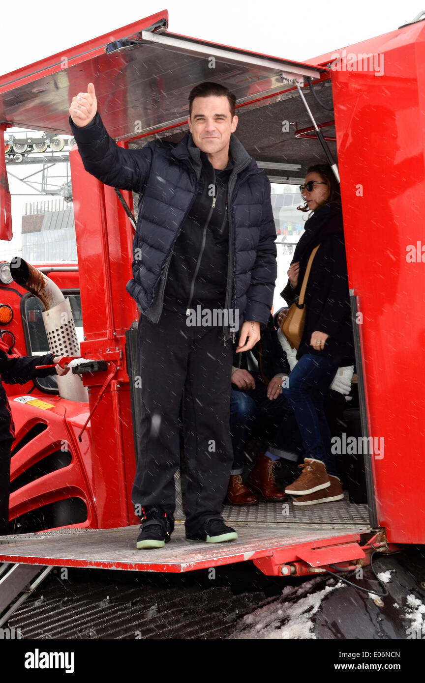 Robbie Williams poses during the "Top of the Mountain Concert" in ...