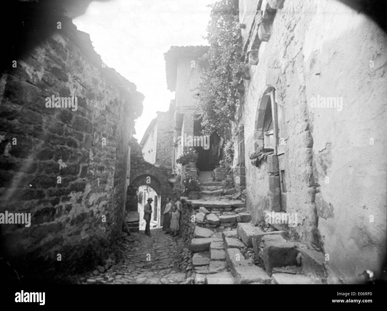 Photograph of a street and gate in Penne, France, capturing the ...
