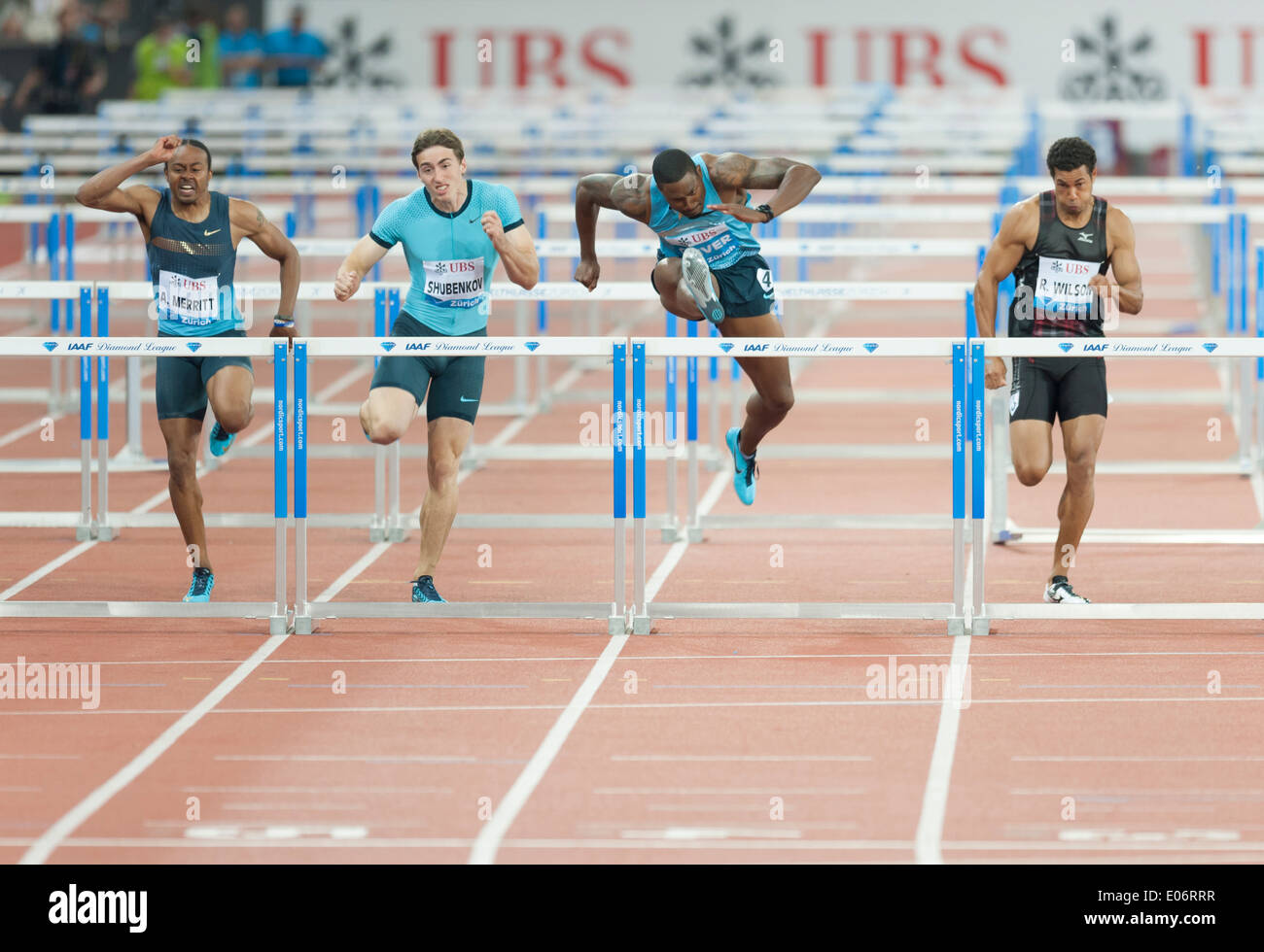 US athlete David Oliver on his way to victory at the 110m hurdles at ...