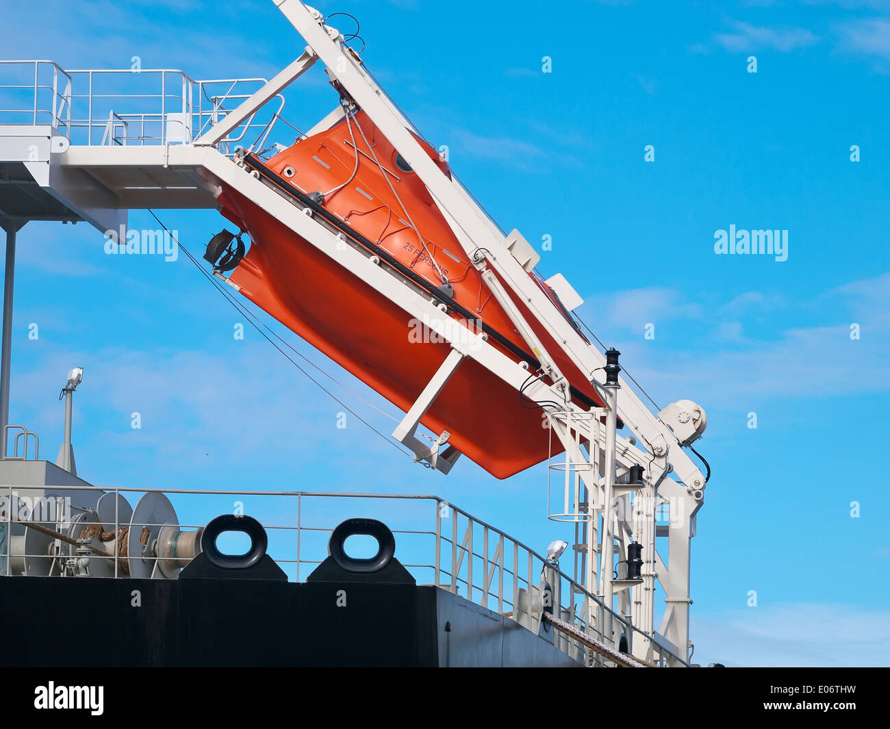 orange free-fall life boat for emergency evacuation Stock Photo - Alamy
