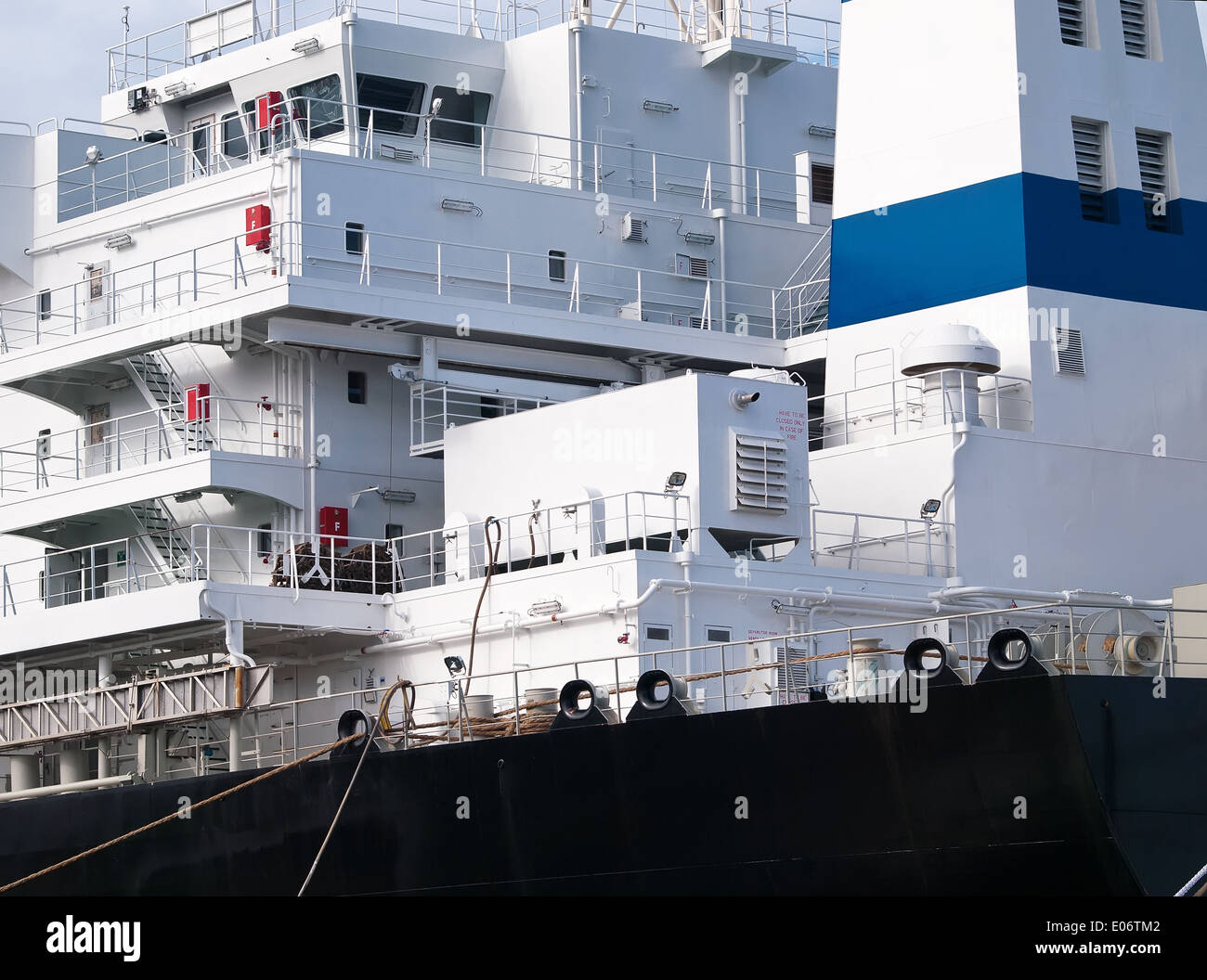 backside view of cargo ship anchored in shipyard Stock Photo - Alamy