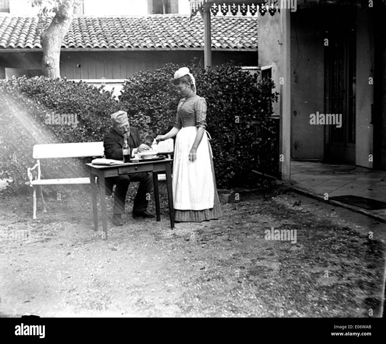 Jobert and his maid in Arcachon, photographed in September 1890. The ...