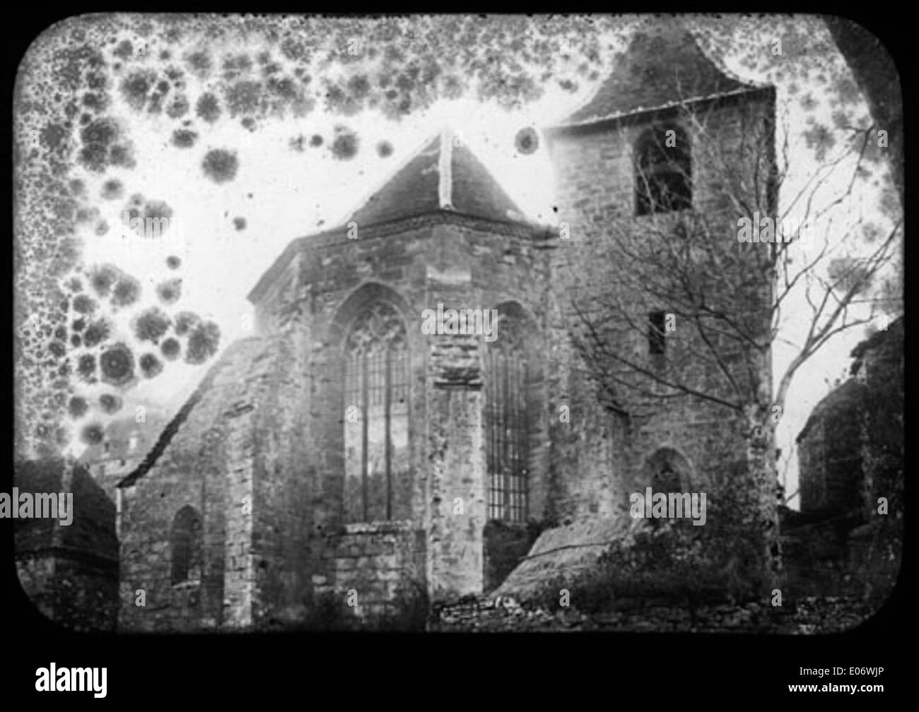 A photograph showing the exterior view of a church with its apse and ...