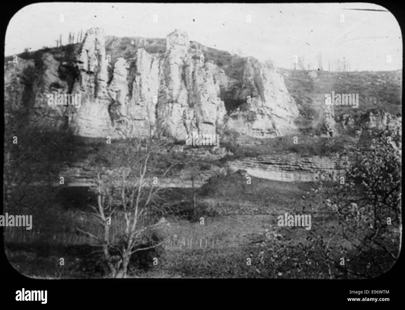 A photograph of a mountain escarpment, showcasing the steep terrain and ...