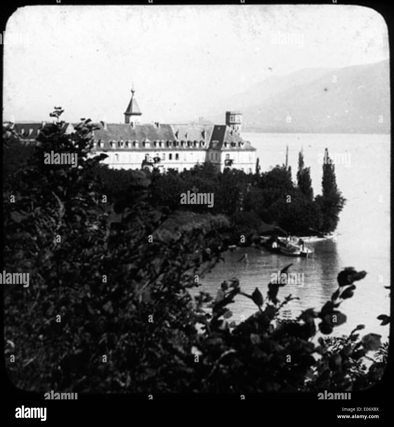 This photograph shows the Abbey of Hautecombe on the shores of Lake ...