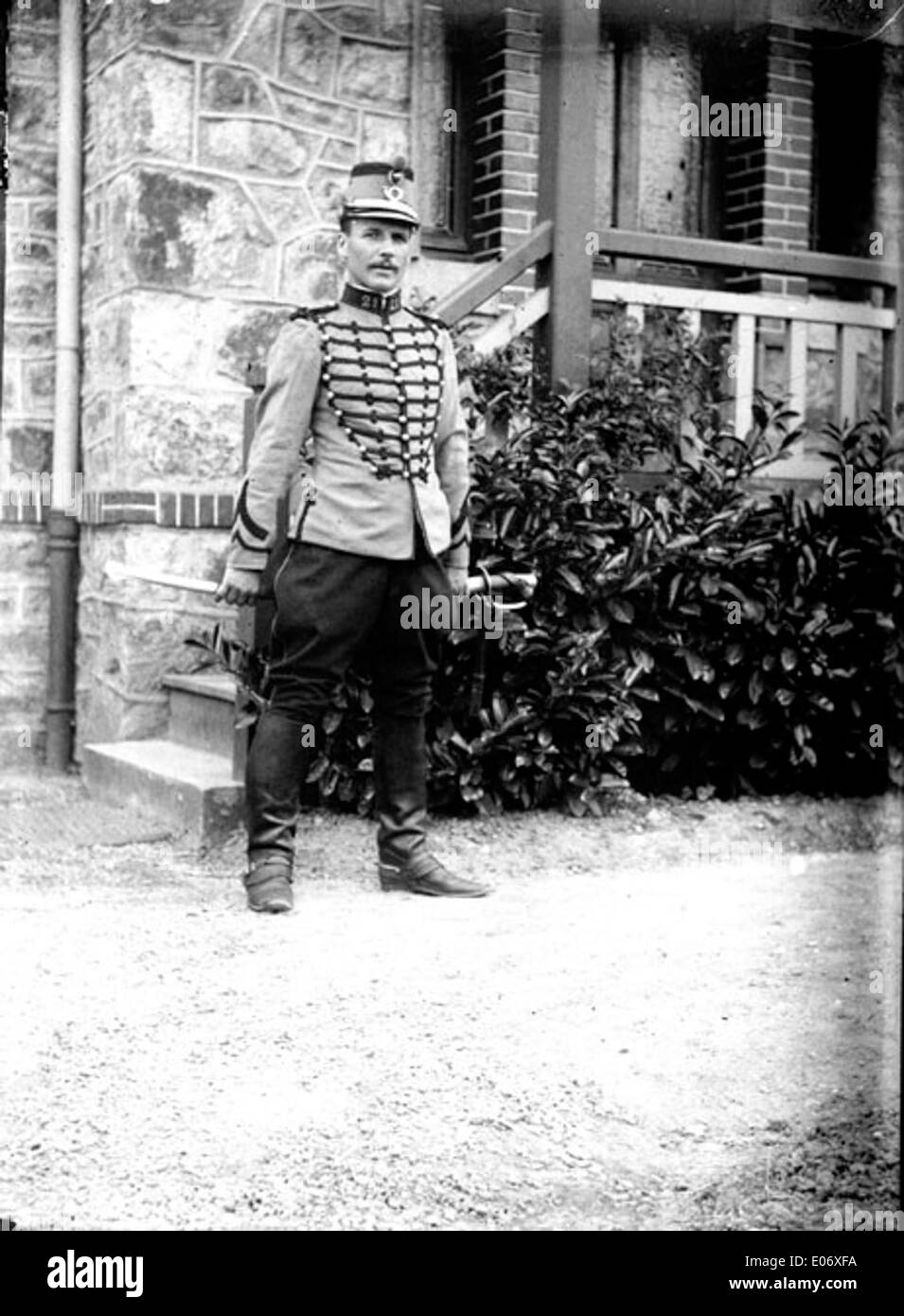 This full-length portrait features a military officer in formal attire ...