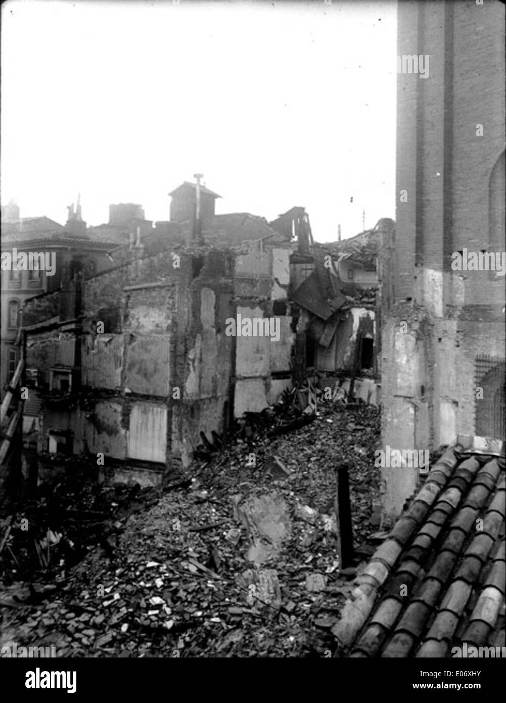 A photograph documenting the destruction of houses after the collapse ...