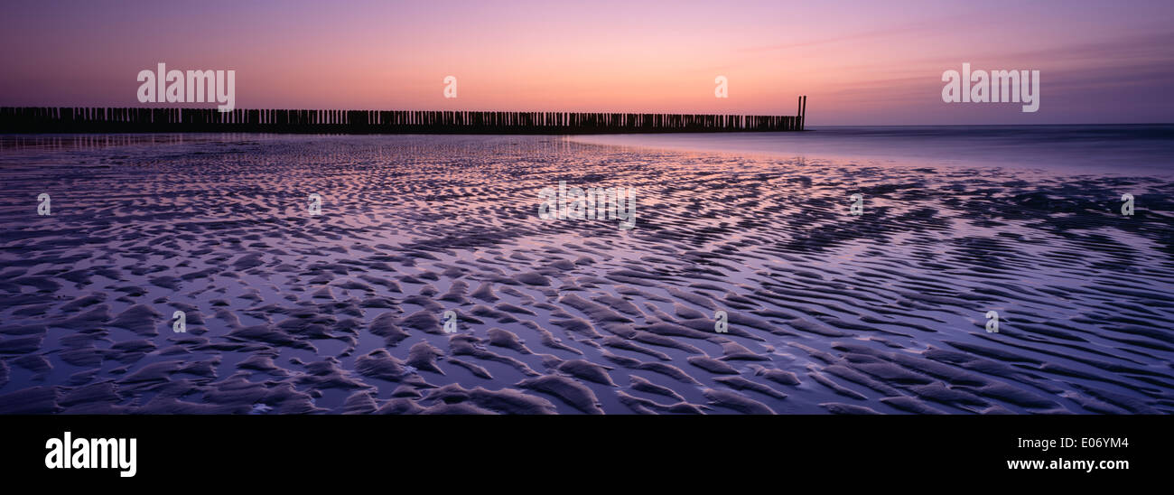 Panoramic shot of sunset at Cadzand beach, North Sea, Holland Stock ...