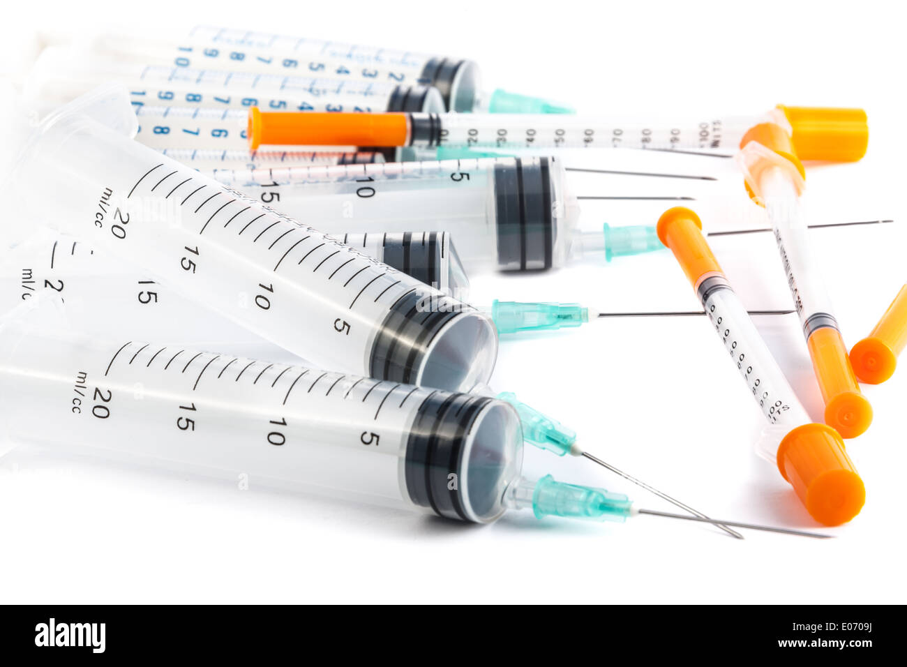 different types of surgical syringes isolated ove a white background ...