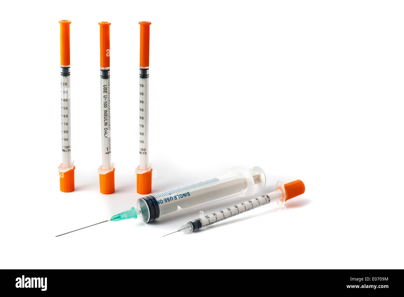 different types of surgical syringes isolated ove a white background ...