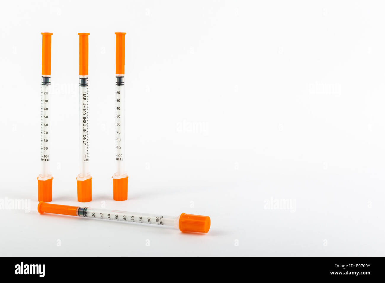different types of surgical syringes isolated over a white background ...
