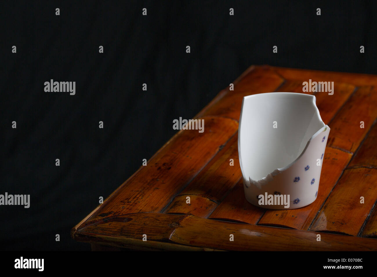 A broken tea cup Stock Photo - Alamy