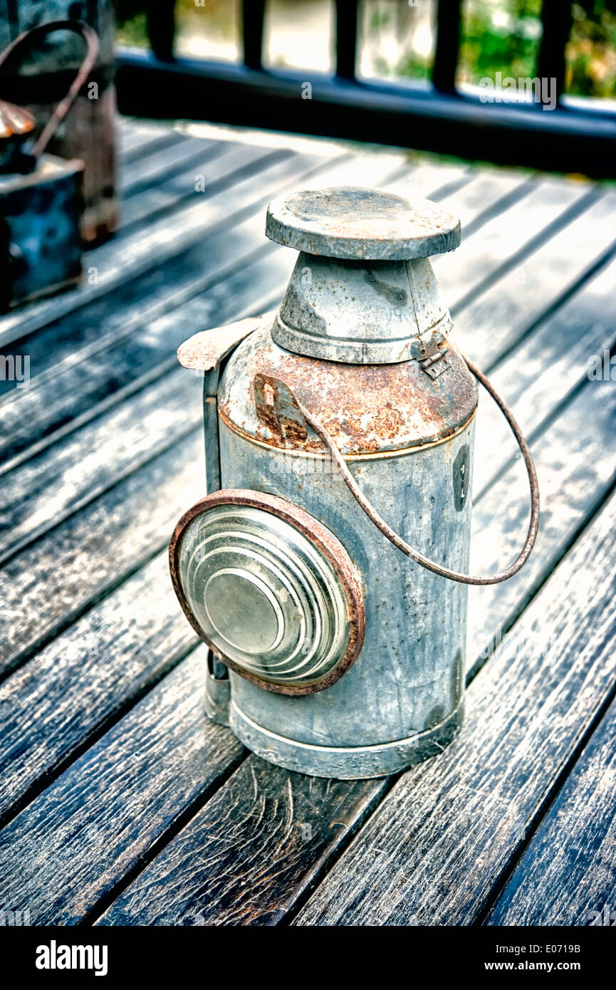 Vintage torch on old wood floor texture Stock Photo - Alamy
