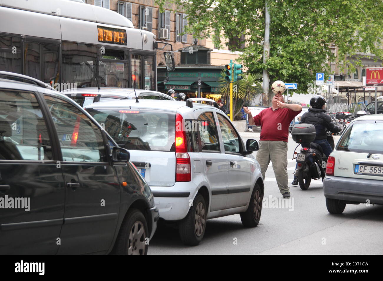 Rome Italy. 3rd May 2014. Street entertainer doing football tricks at ...