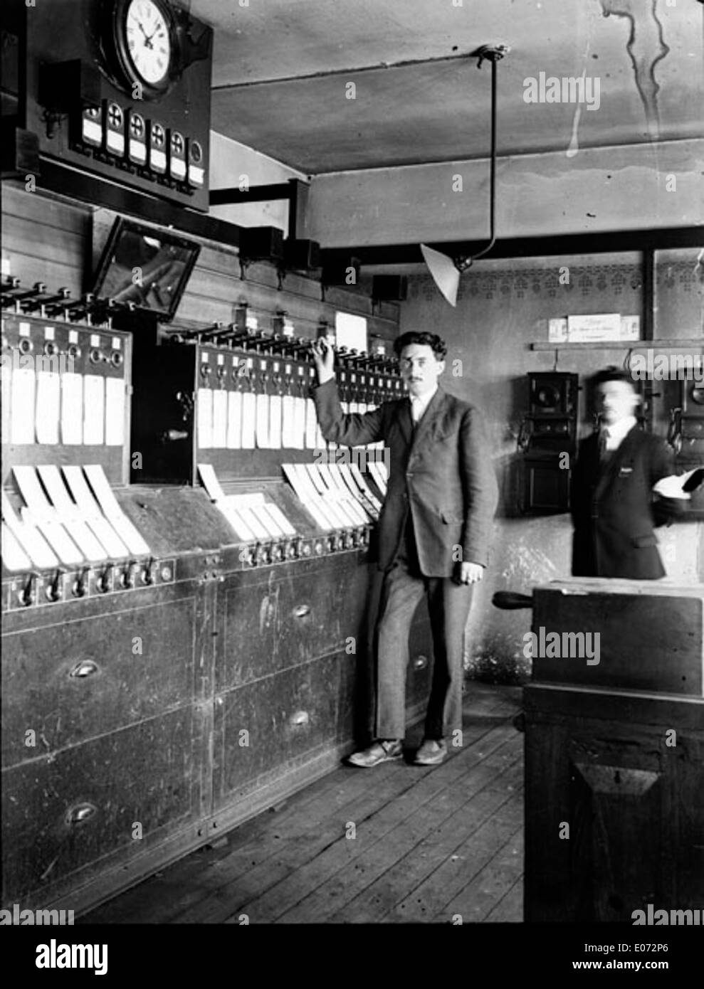 This historical photograph depicts railway operations in the signaling ...