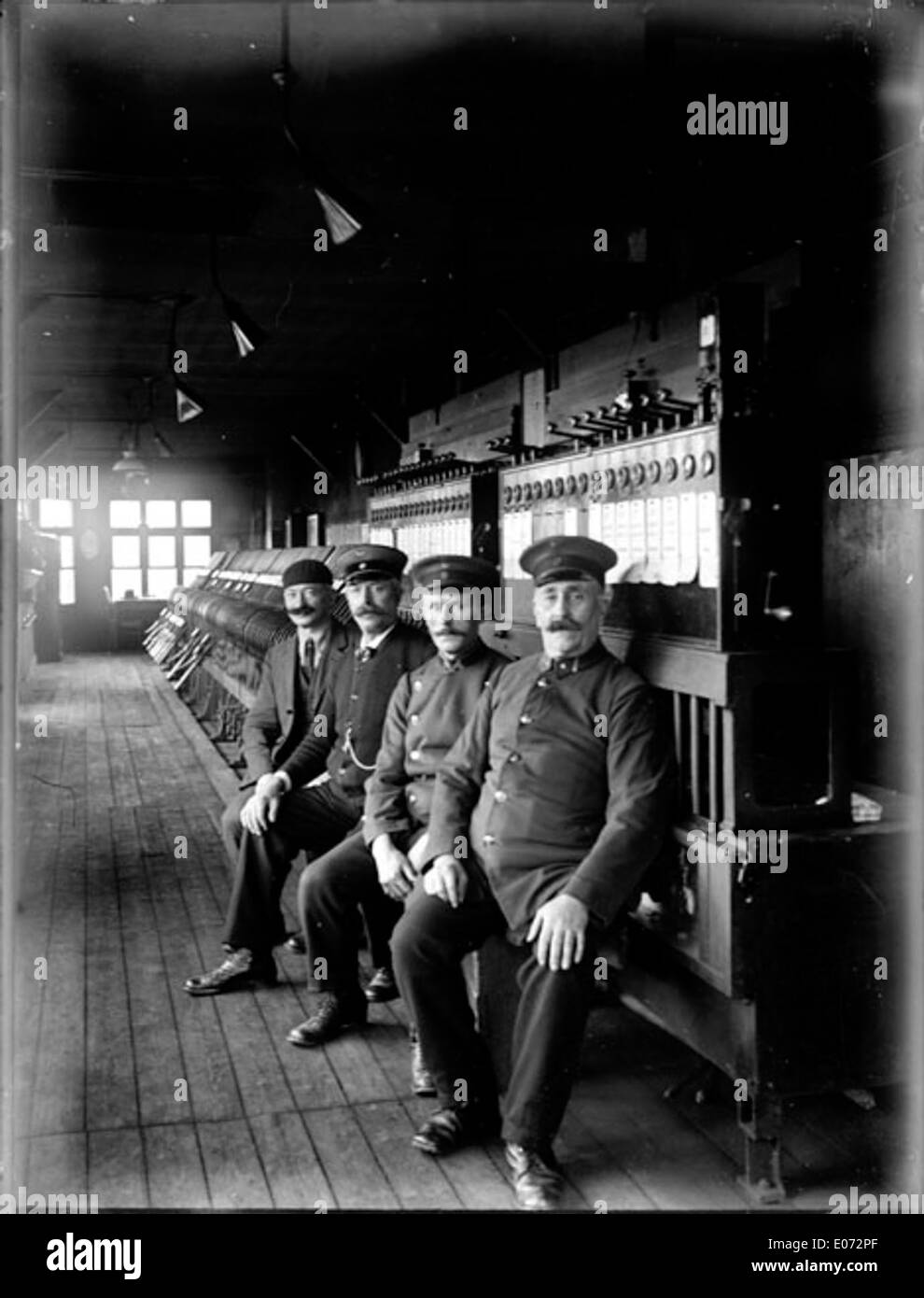 This historical image shows the operation of the railway signal box at ...