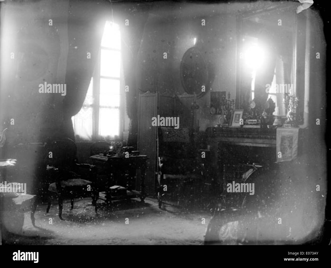 The artwork 'Intérieur d'un salon bourgeois' depicts the interior of a ...