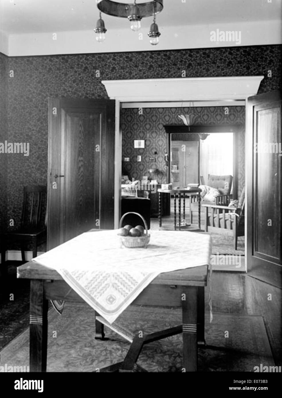 This illustration depicts the interior of a dining room and salon in ...