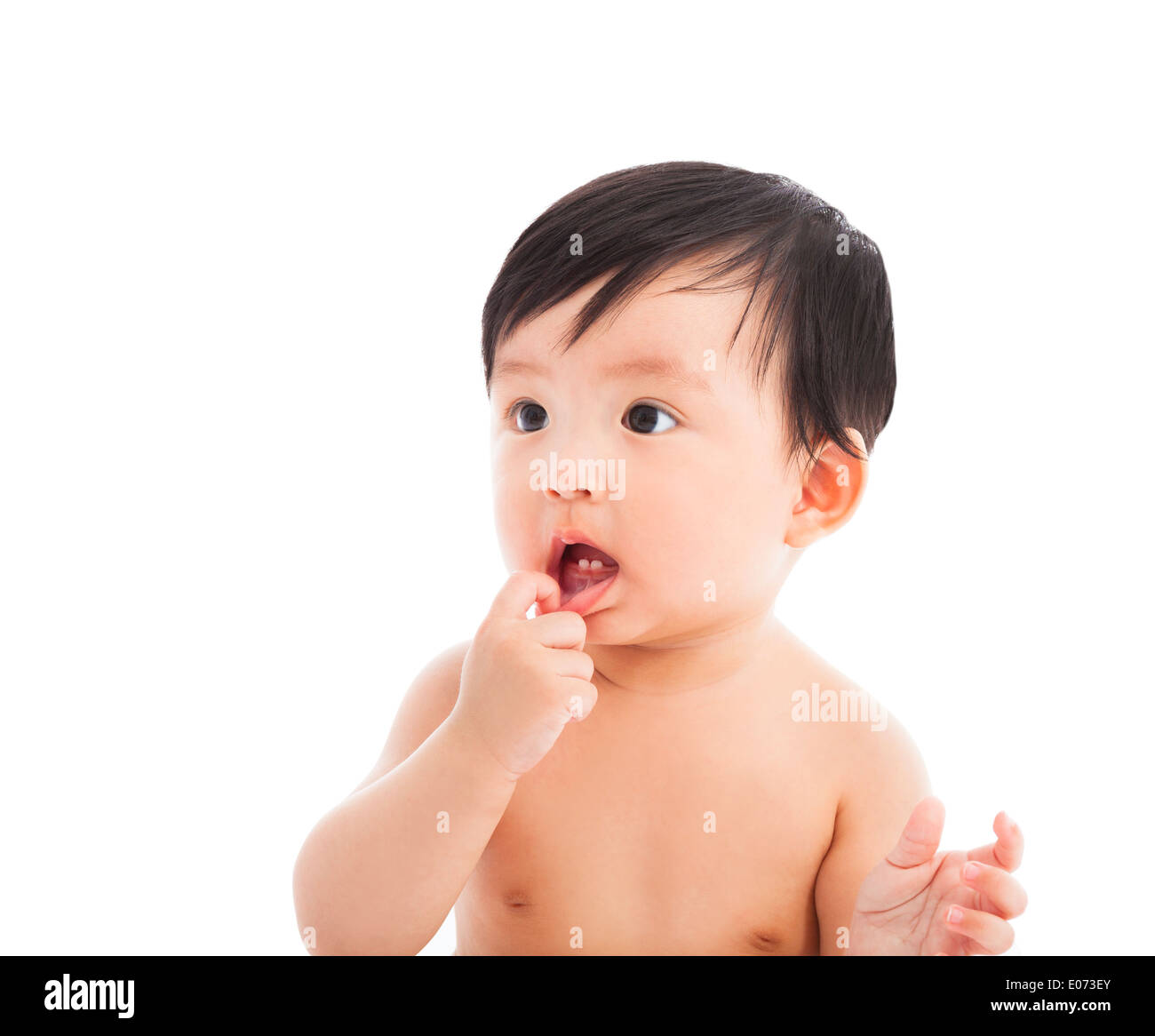 adorable Infant child baby sitting and look up Stock Photo - Alamy
