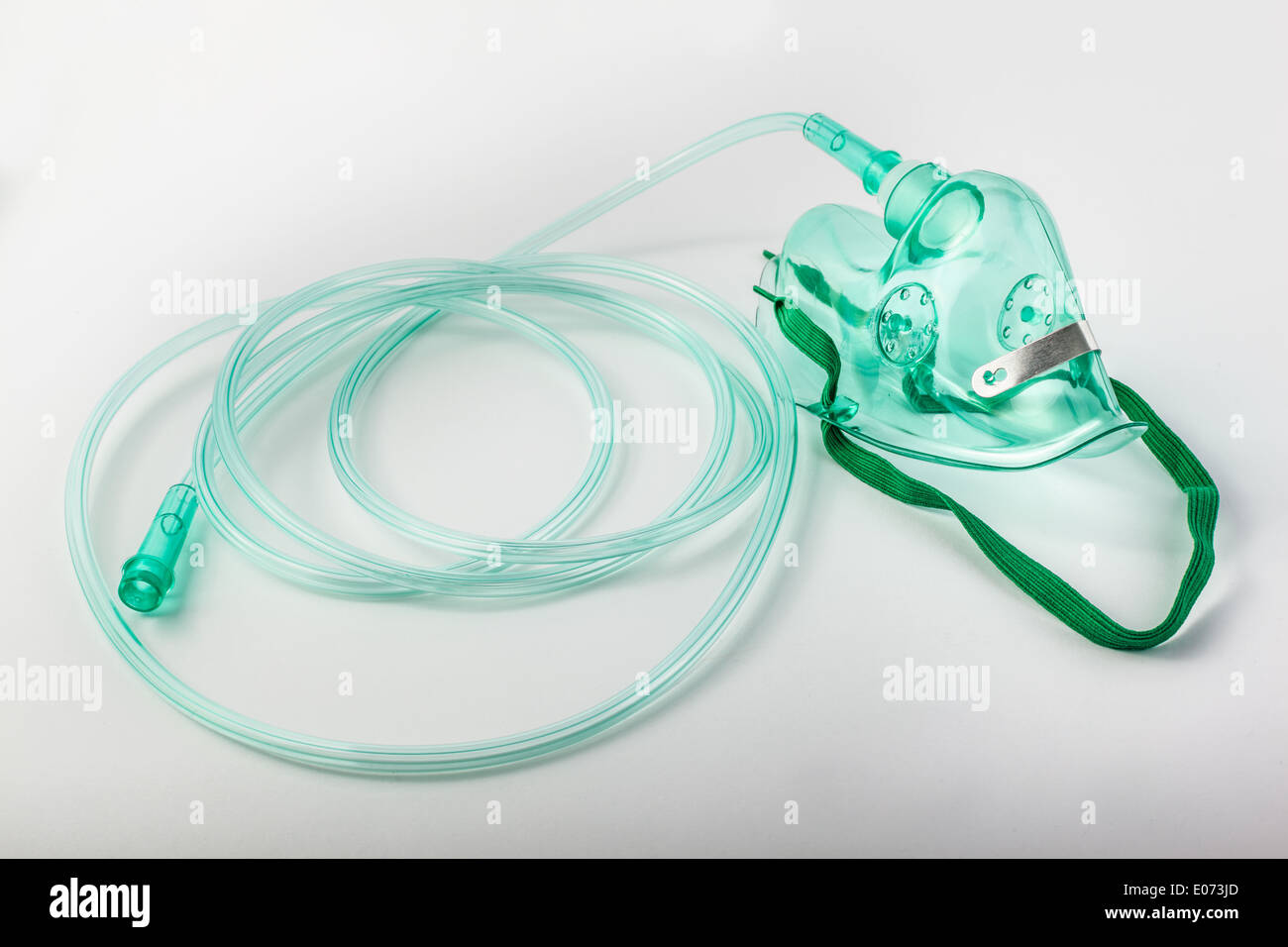 a medical oxygen mask isolated over a white background Stock Photo - Alamy